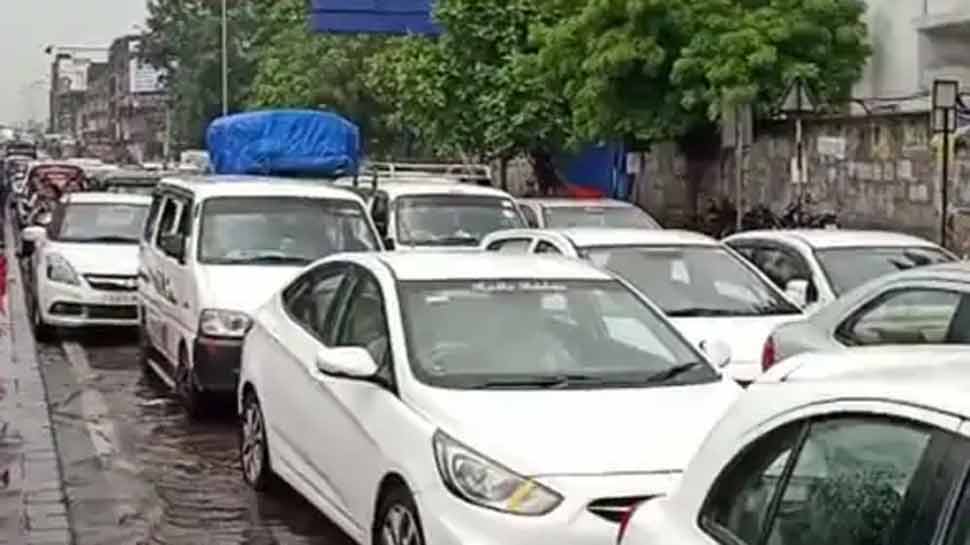 7 inches of rain, SURAT, flooded entire city, causing traffic jams ...