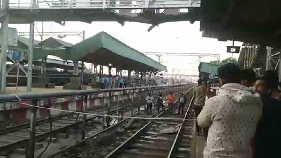 Slabs fall off of a foot over bridge at Balharshah railway junction in ...