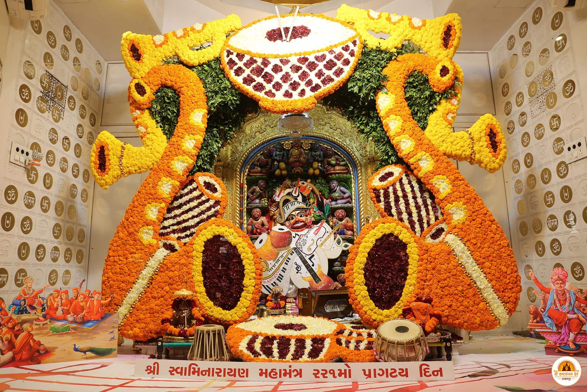 salangpur hanuman dada decoration with flowers and musical instruments ...